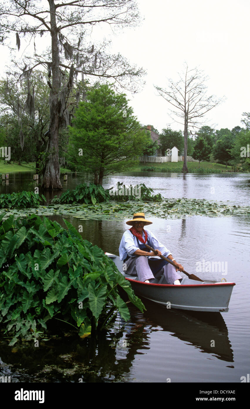 A Cajun pirogue in Bayou Vermillion at Vermillionville living history ...