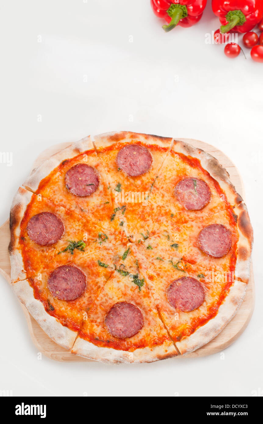 Italian original thin crust pepperoni pizza Stock Photo - Alamy