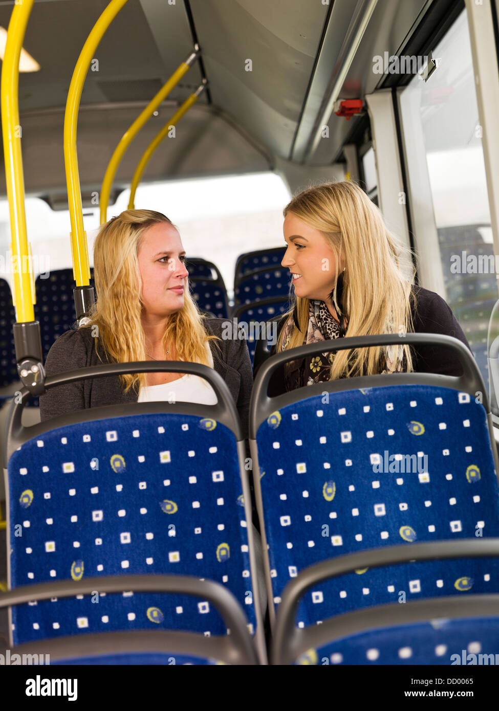 Women on a bus Stock Photo - Alamy