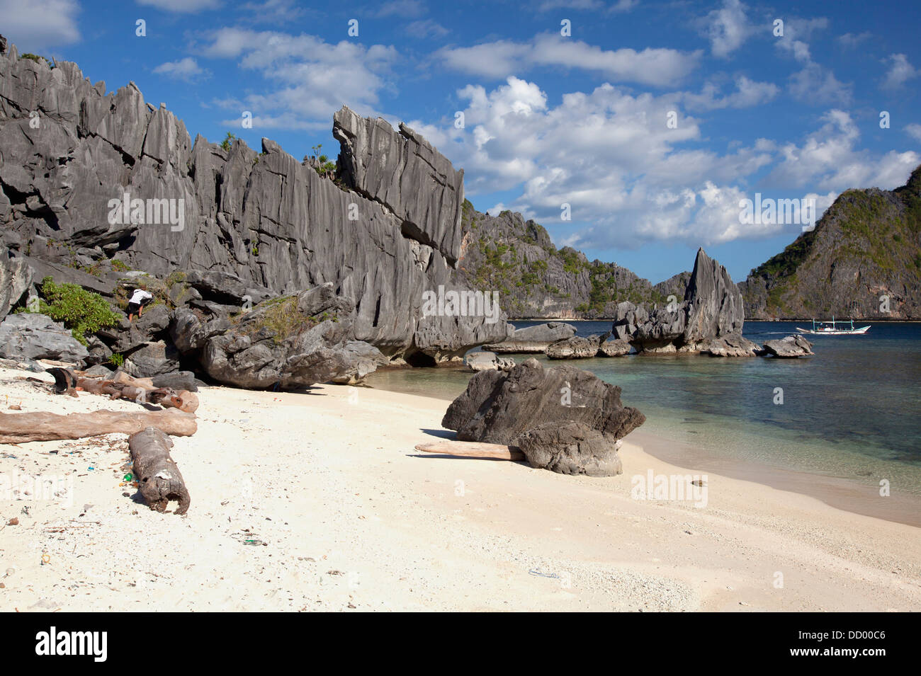 A Man Climbs Limestone Rock Formations; Tapiutan Island, Palawan ...