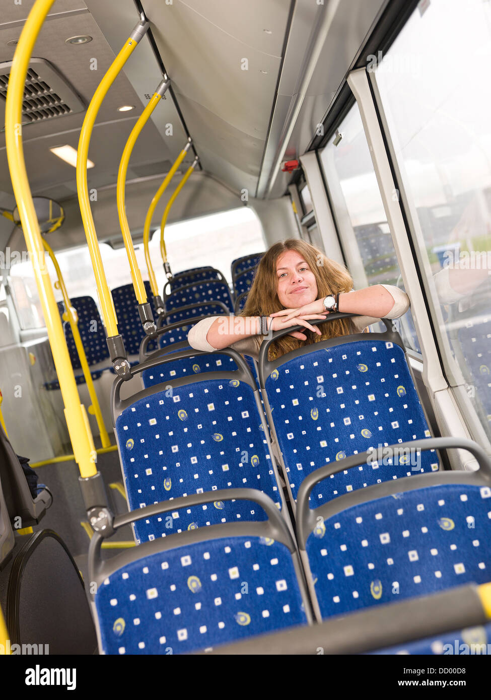 Alone on the bus Stock Photo - Alamy