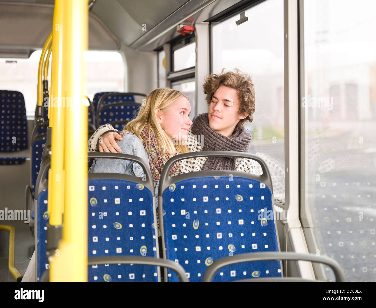 Couple on the bus Stock Photo - Alamy