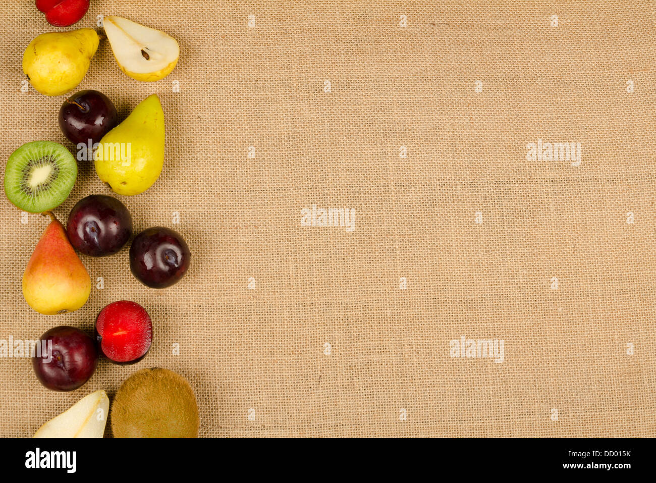 Assorted fresh fruit arranged in a background Stock Photo - Alamy