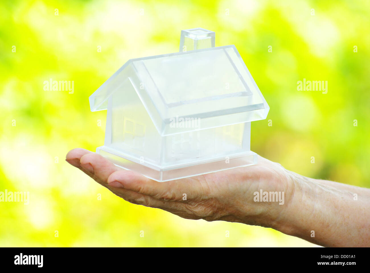 house in human hand Stock Photo - Alamy
