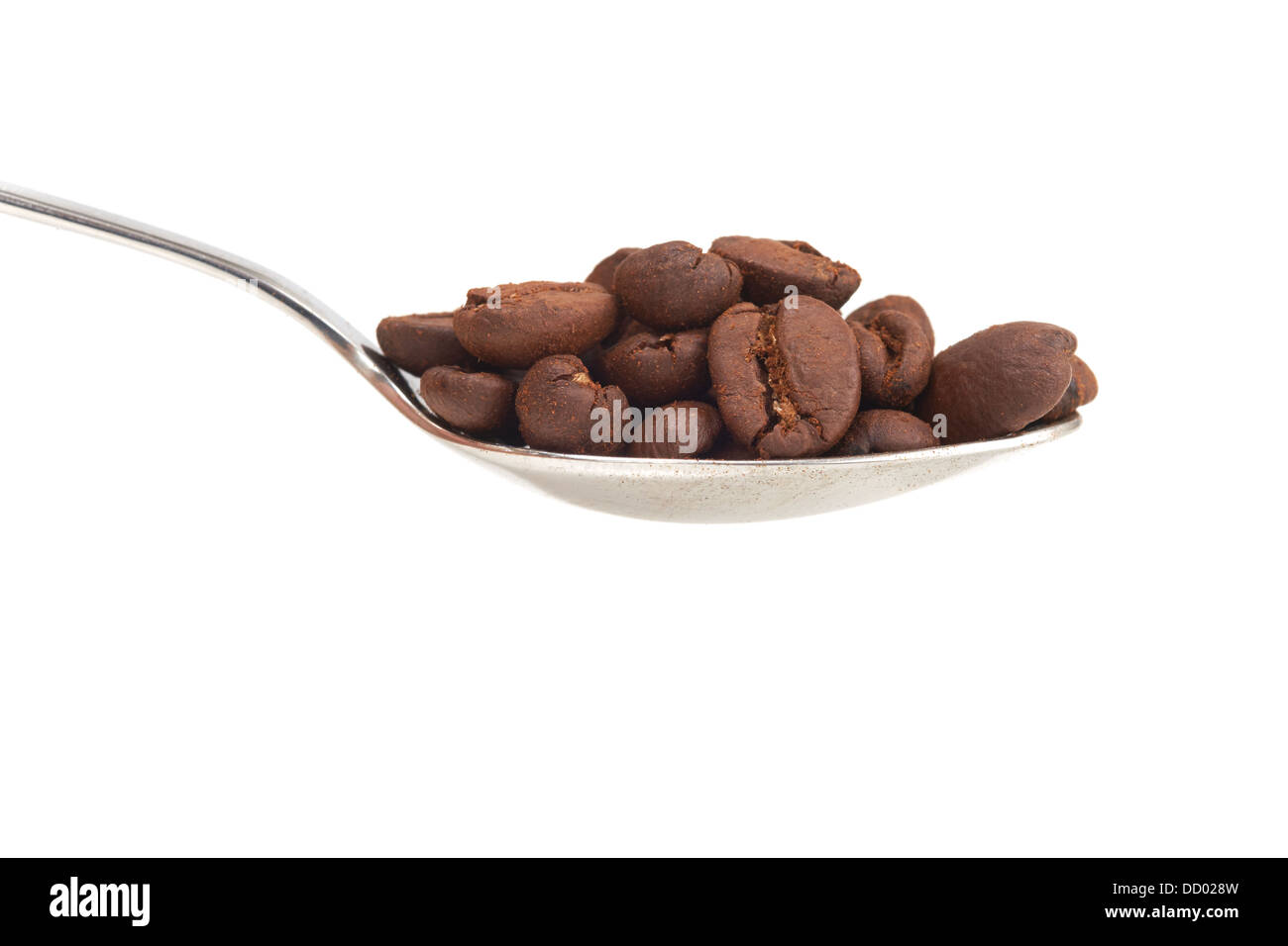 Spoon of coffee on a white background Stock Photo - Alamy