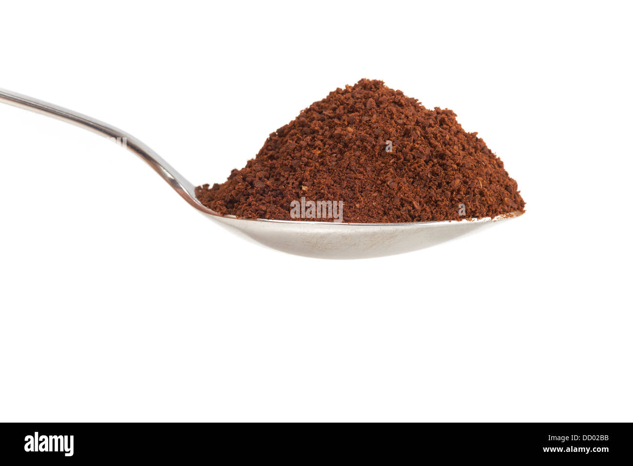 Spoon of coffee on a white background Stock Photo - Alamy