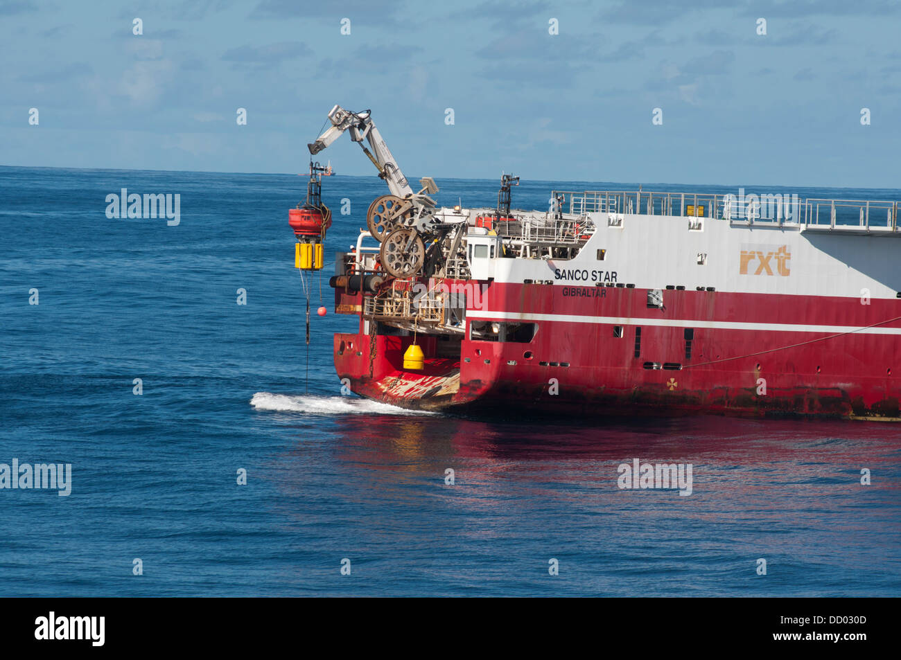 Stern of the seismic vessel Sanco Star, picking up seismic buoys at ...