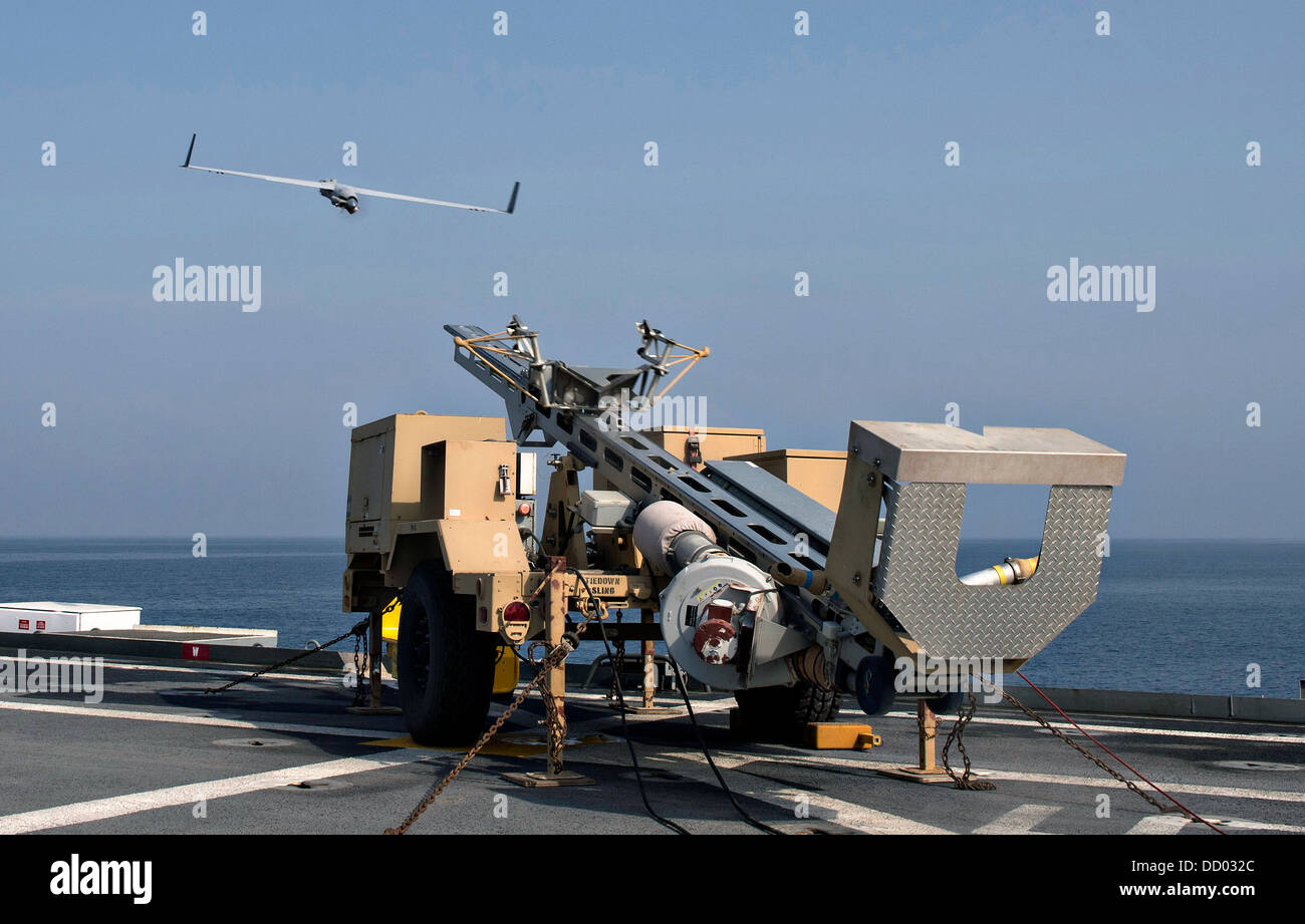 A Scan Eagle unmanned aerial vehicle launches from the flight deck of ...