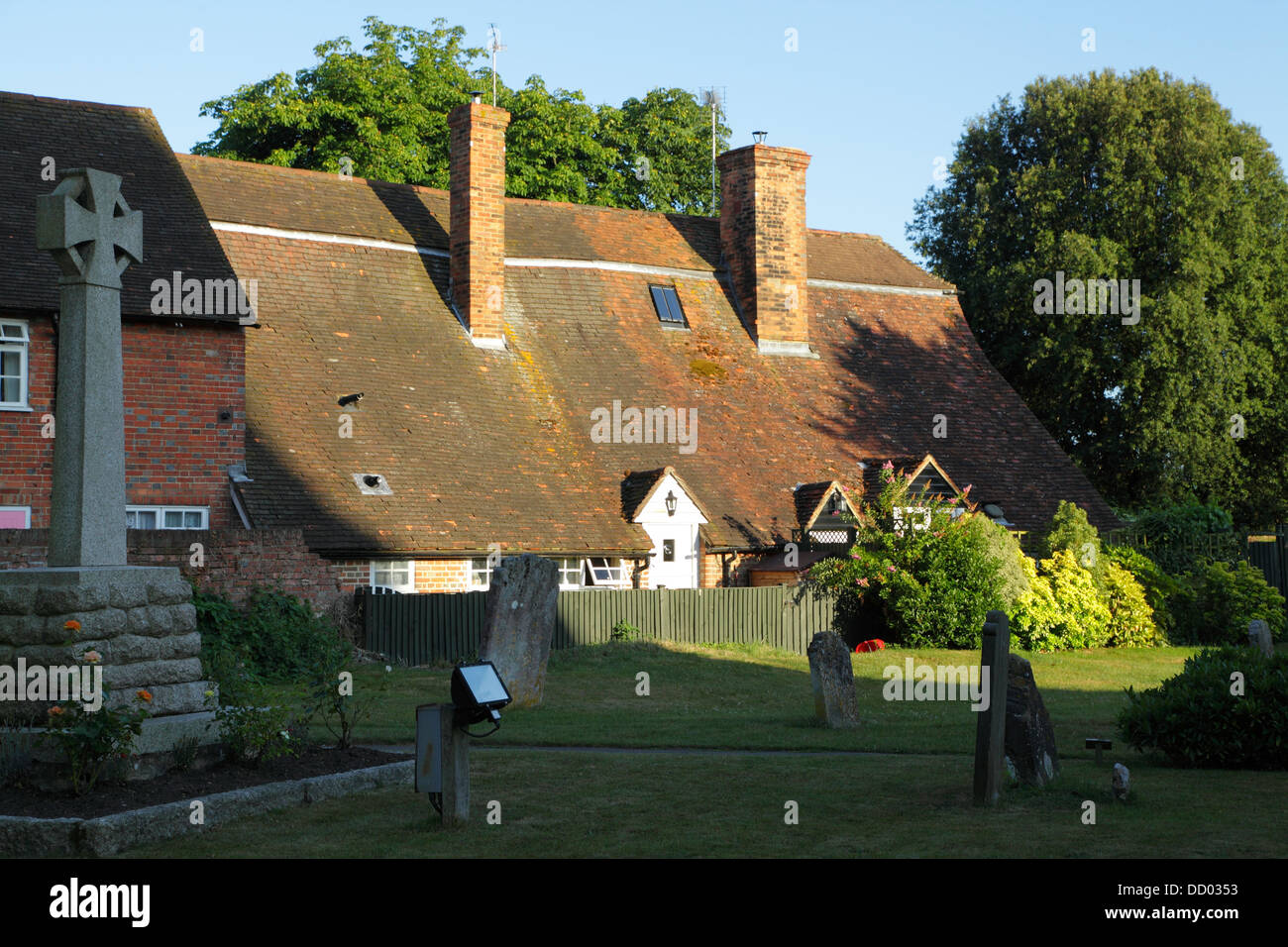 Traditional Kentish red tiled catslide roof of house beside the ...