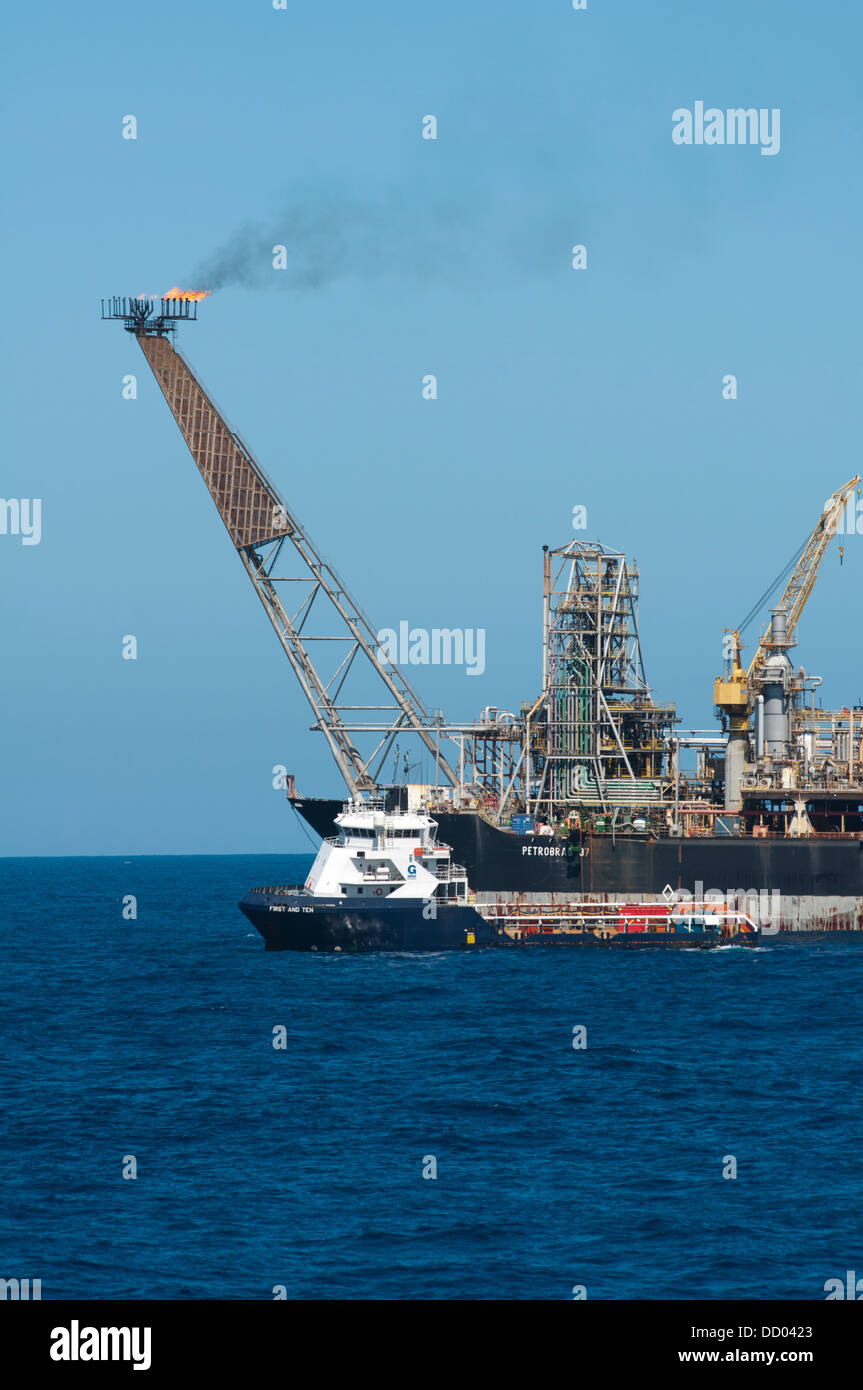 supply vessel close to an FPSO oil rig at Campos basin, Offshore Rio de ...