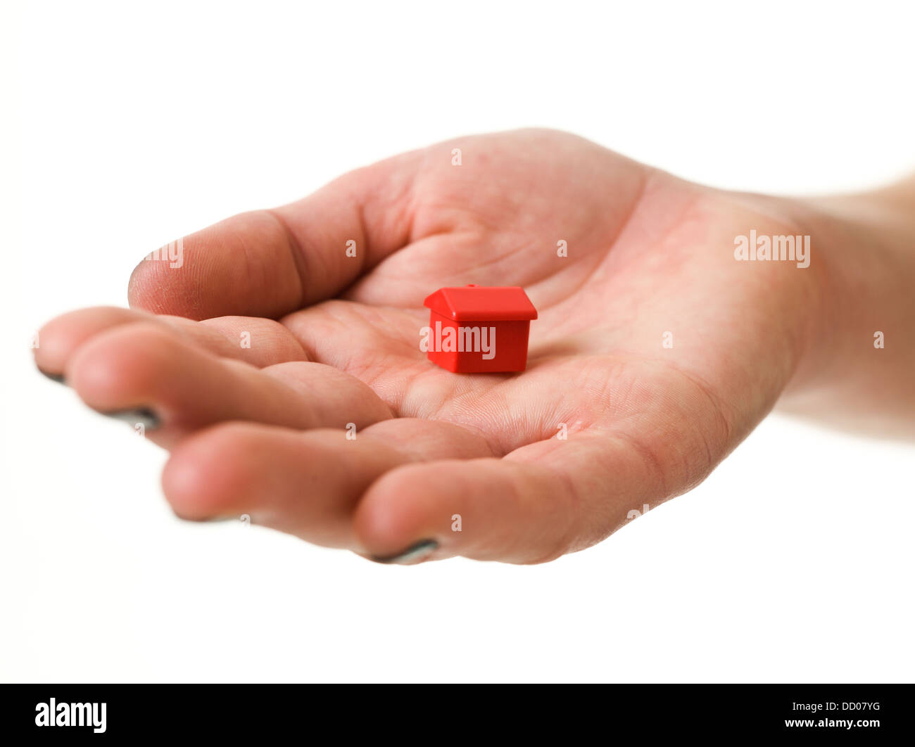 Hand with House Stock Photo - Alamy
