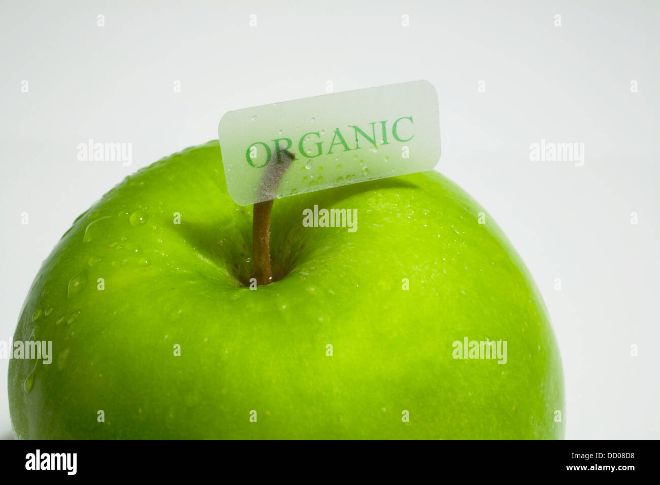 Granny Smith Apple With Water Drops And An Organic Label; Waterloo ...