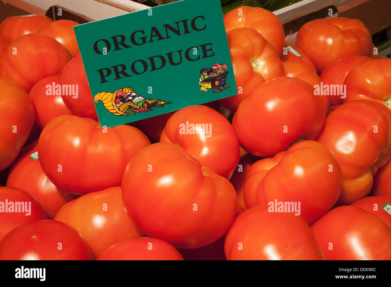 Tomatoes With A Sign Labeled Organic Produce; Waterloo, Quebec, Canada ...