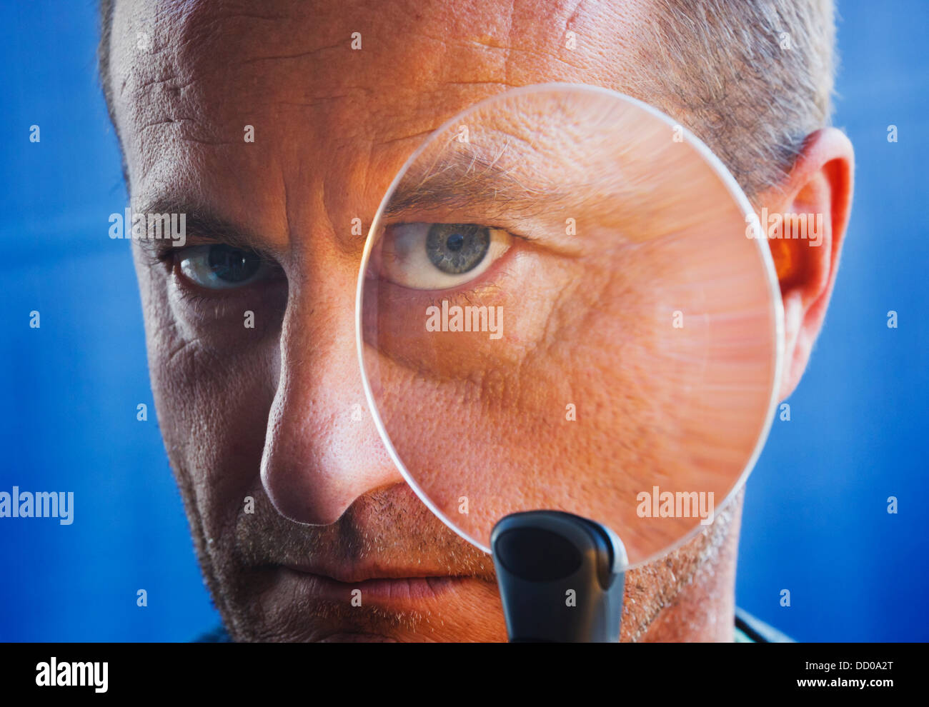 Inspecting eye glasses hi-res stock photography and images - Alamy