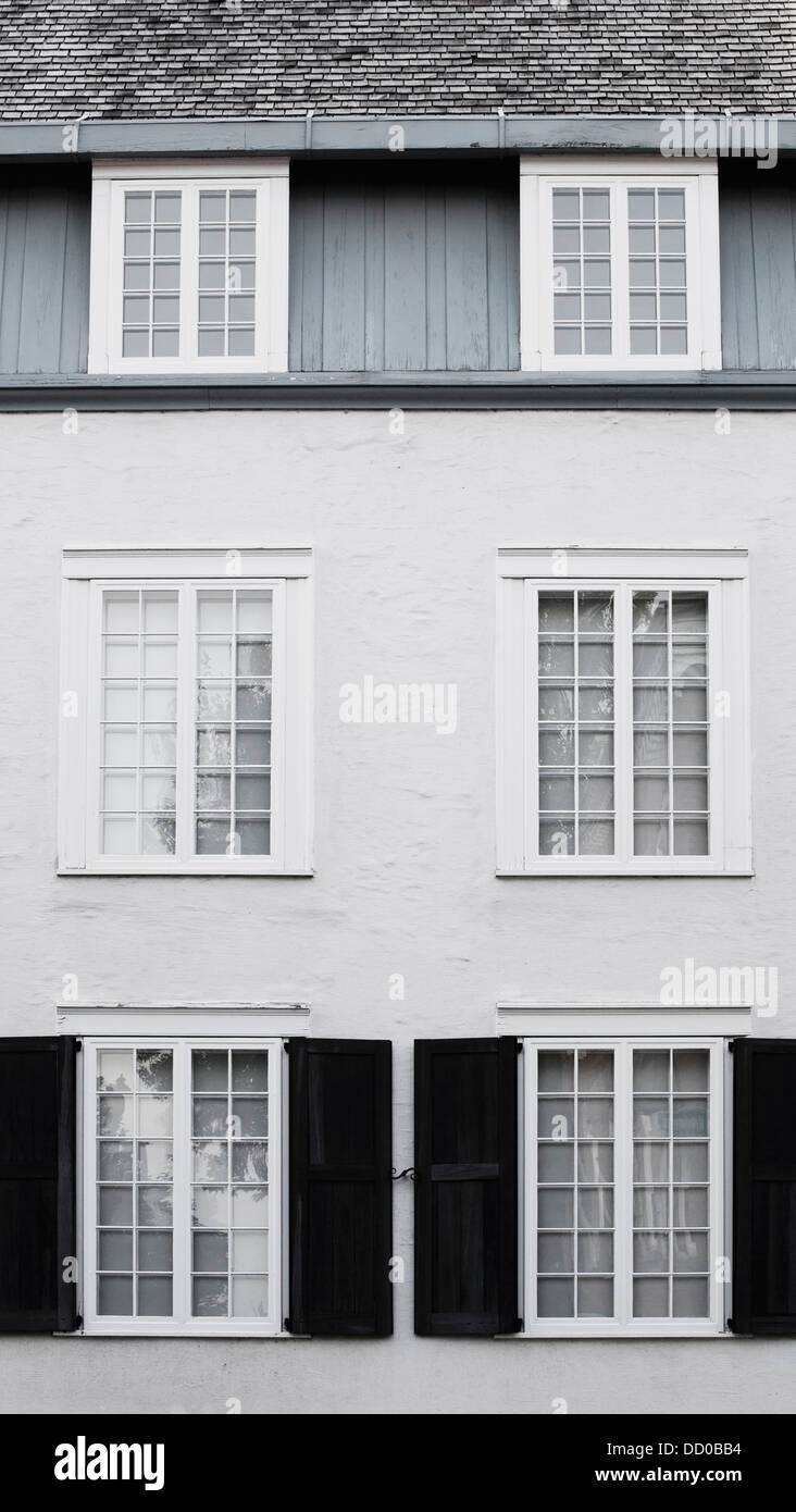 Three story building white building windows hi-res stock photography ...