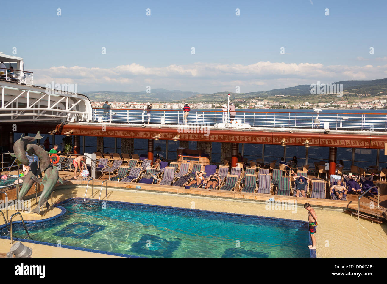 Passengers relaxing by a pool, The Noordam cruise ship, one of the ...