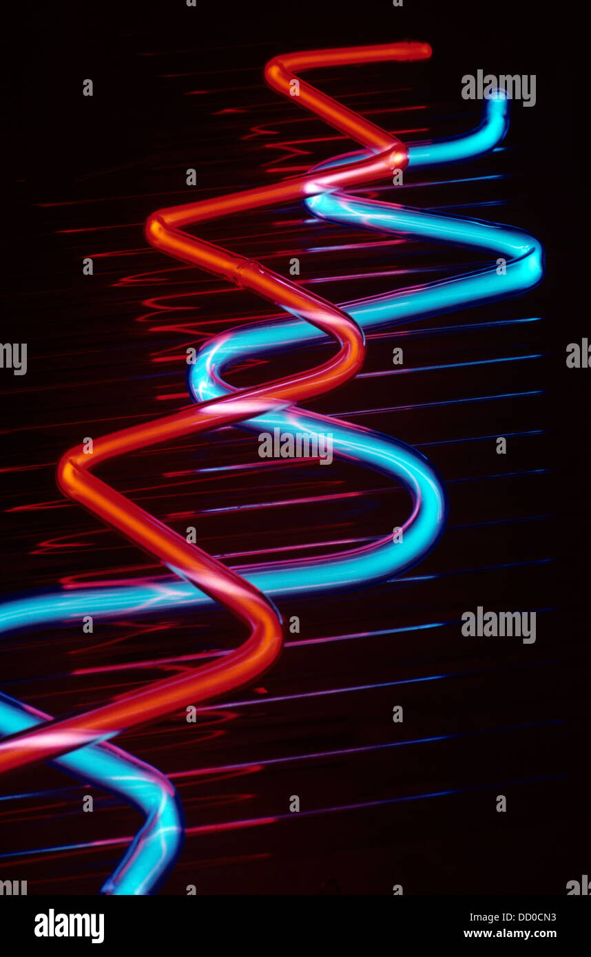 Red and blue neon tubes on table in artist workshop Stock Photo - Alamy