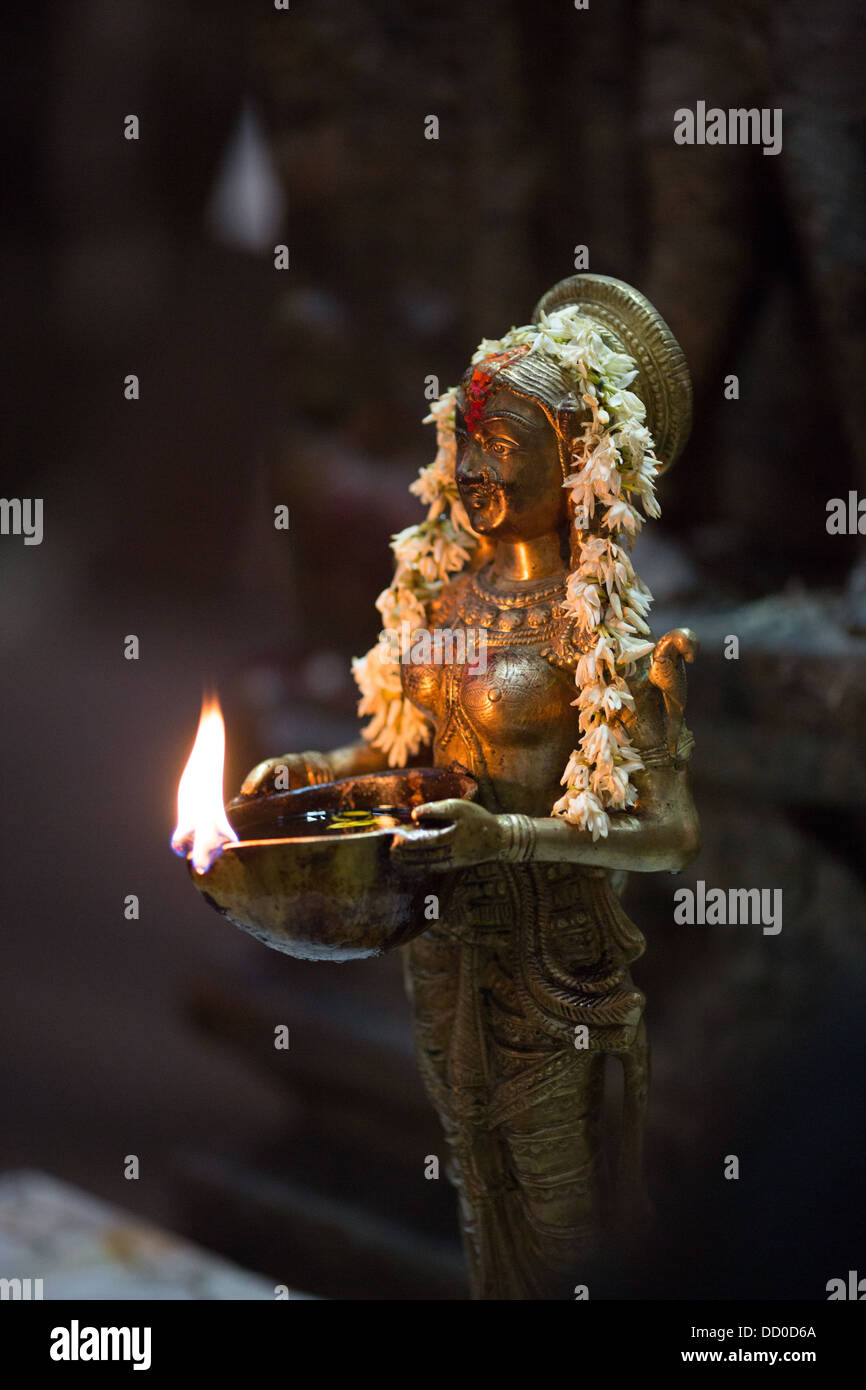 Oil lamps in a tibetan buddhist temple Stock Photo - Alamy