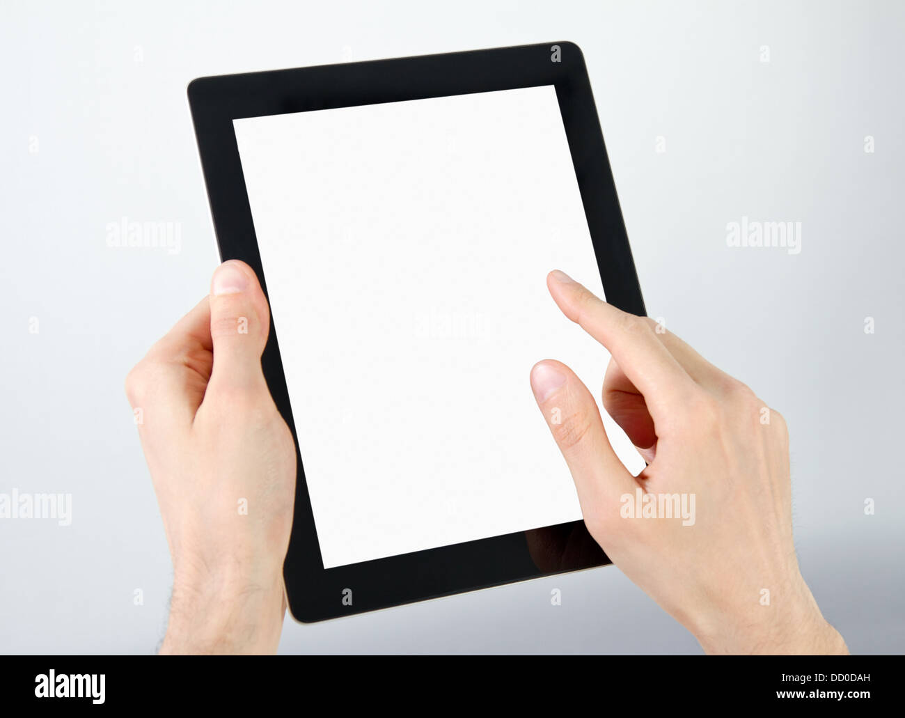 Holding And Point On Electronic Tablet PC Stock Photo - Alamy