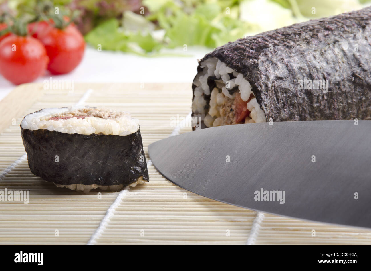 sushi roll before it is cut into portions Stock Photo - Alamy