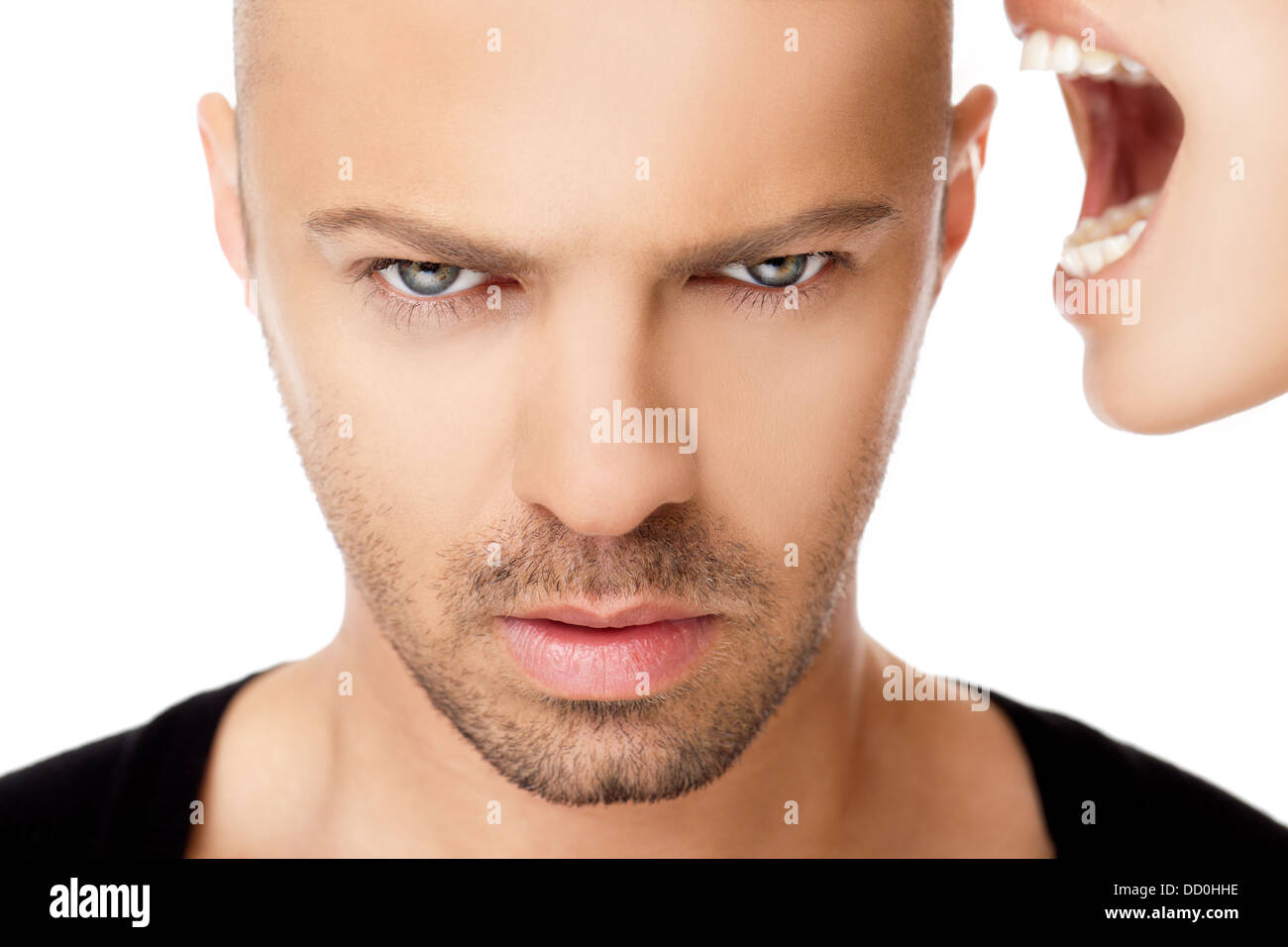 Female screaming at male ear Stock Photo - Alamy