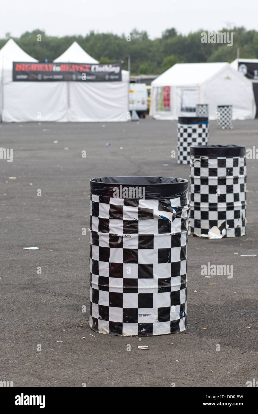 Empty Trash Cans in a line at a Festival with Tents in Background Stock ...