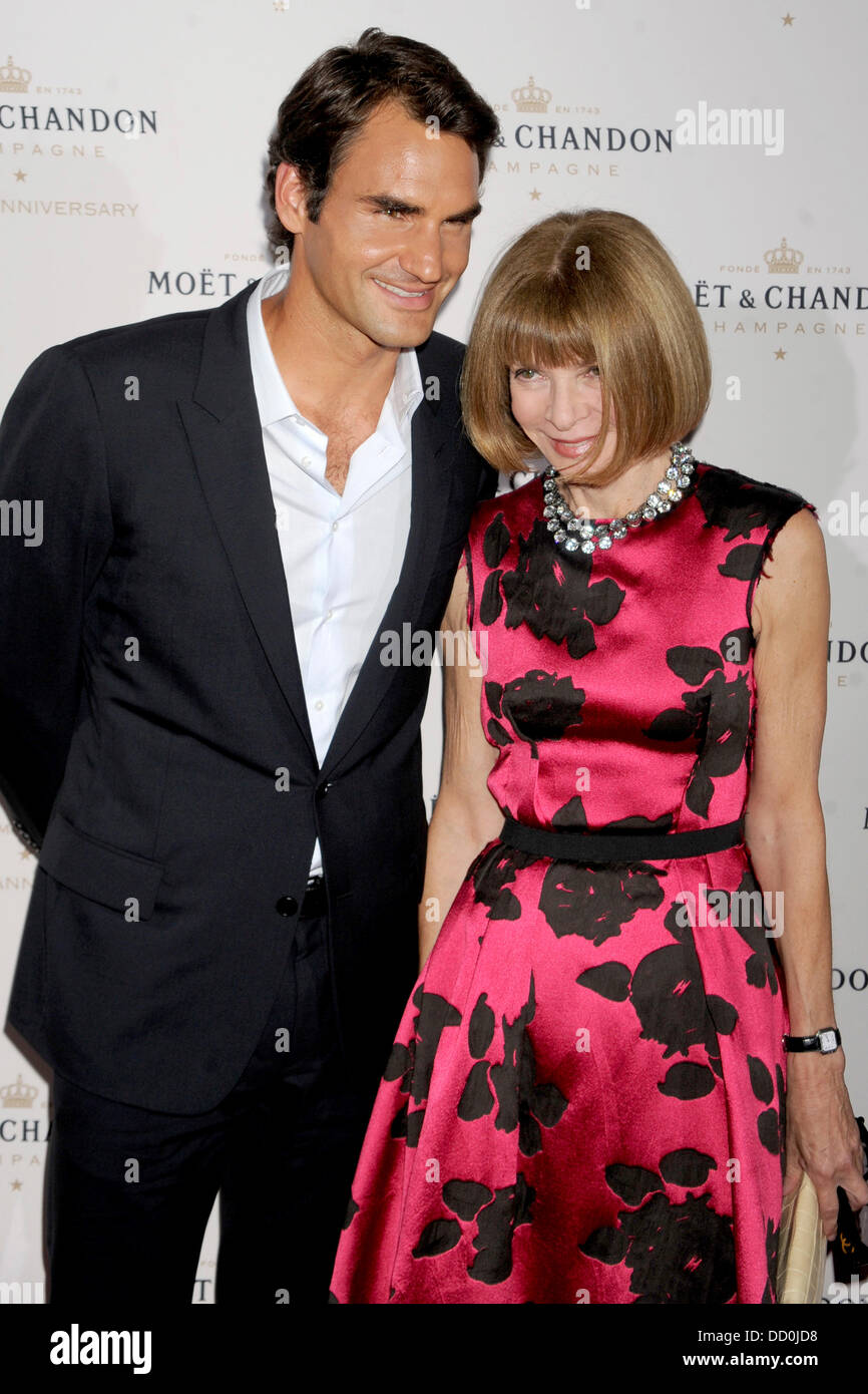 Professional tennis player Roger Federer (L) and Vogue Editor-in-Chief ...
