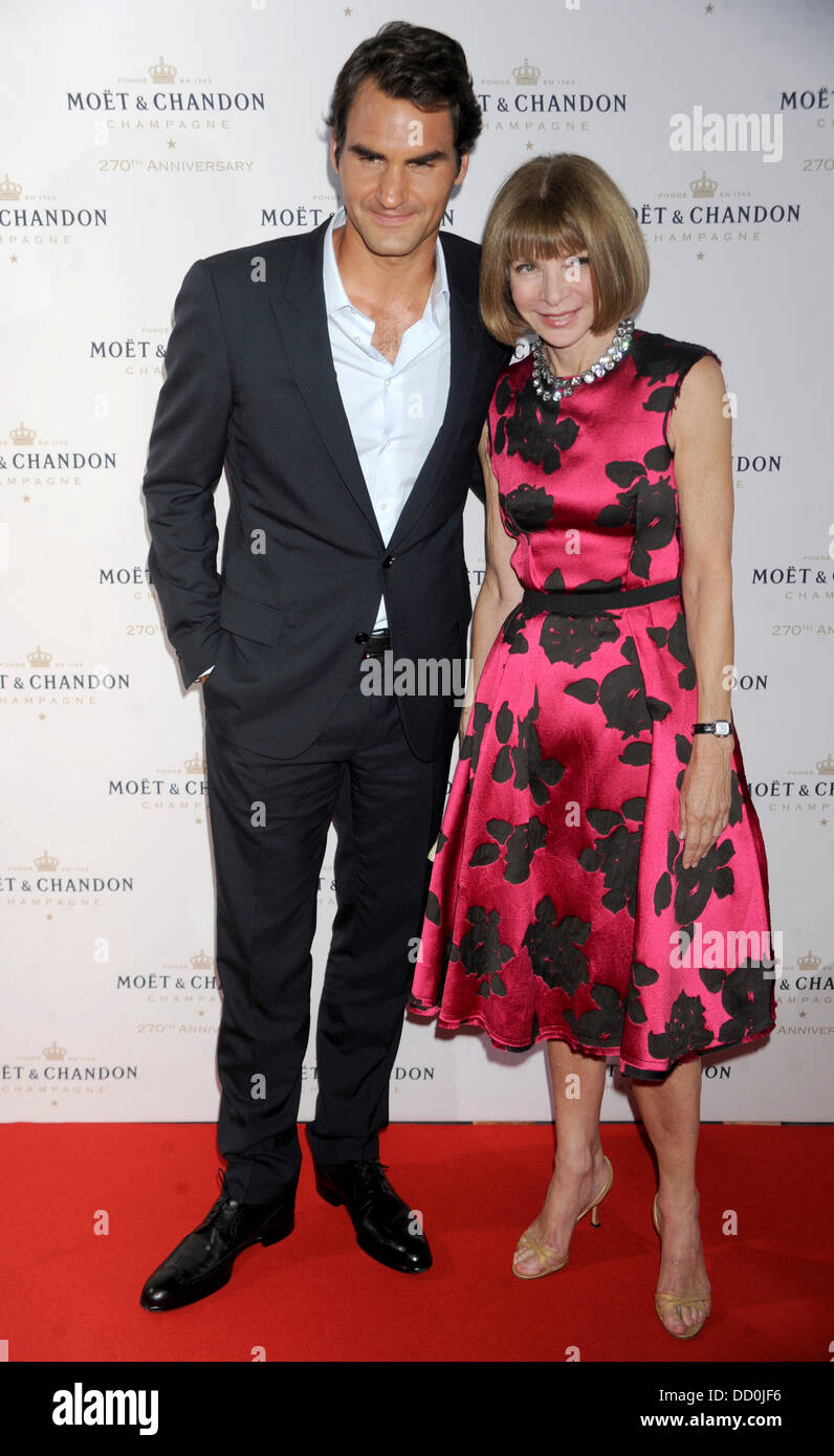 Professional tennis player Roger Federer (L) and Vogue Editor-in-Chief ...