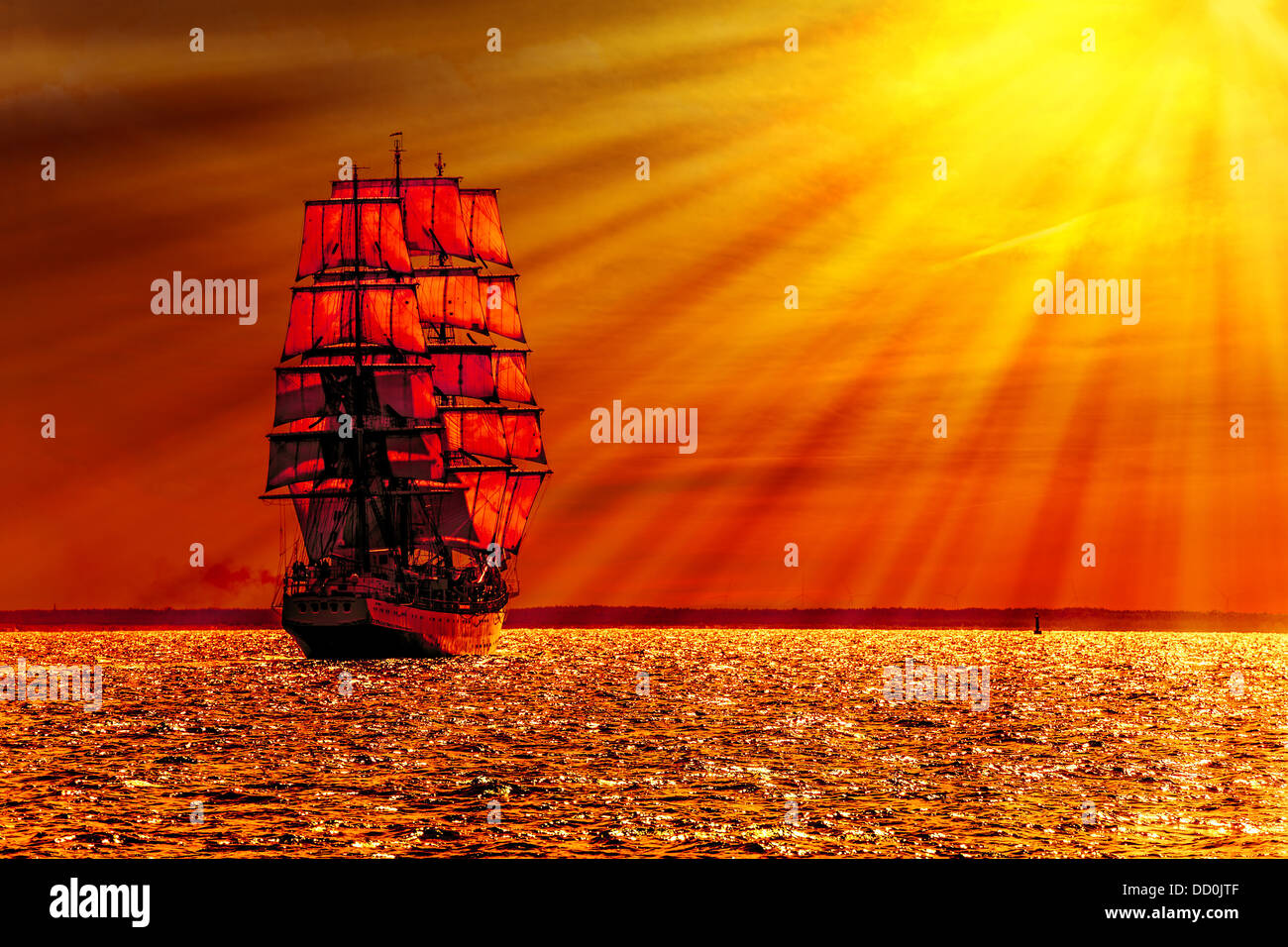 Sailing ship on the sea at sunset skyline Stock Photo - Alamy