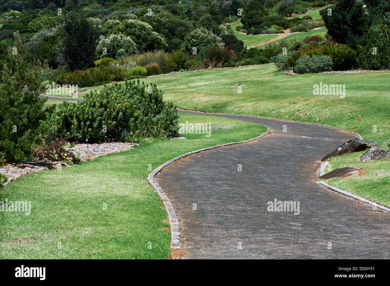 Pathway in a park Stock Photo - Alamy