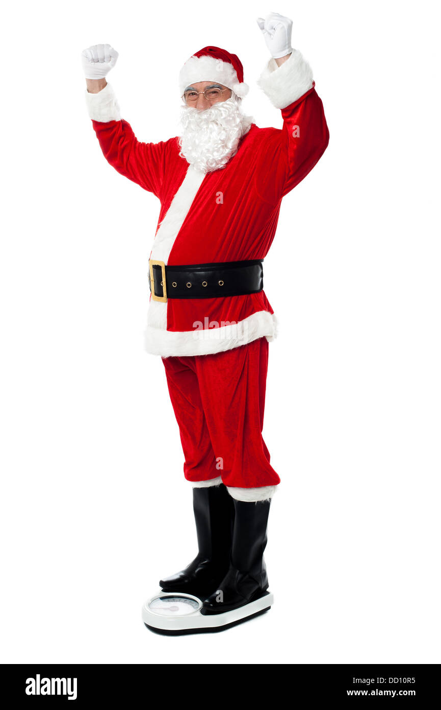 Santa sheds precious pounds! Pumping his fists in the air Stock Photo ...