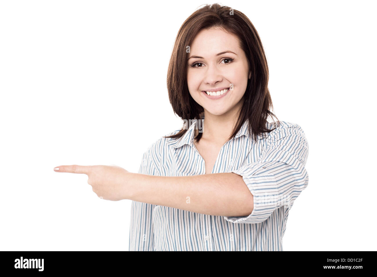 Attractive young woman pointing away in a different direction Stock ...