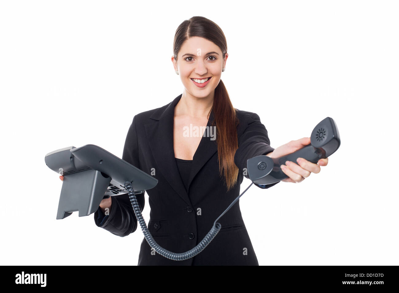 Female secretary handing over phone receiver to her boss Stock Photo ...