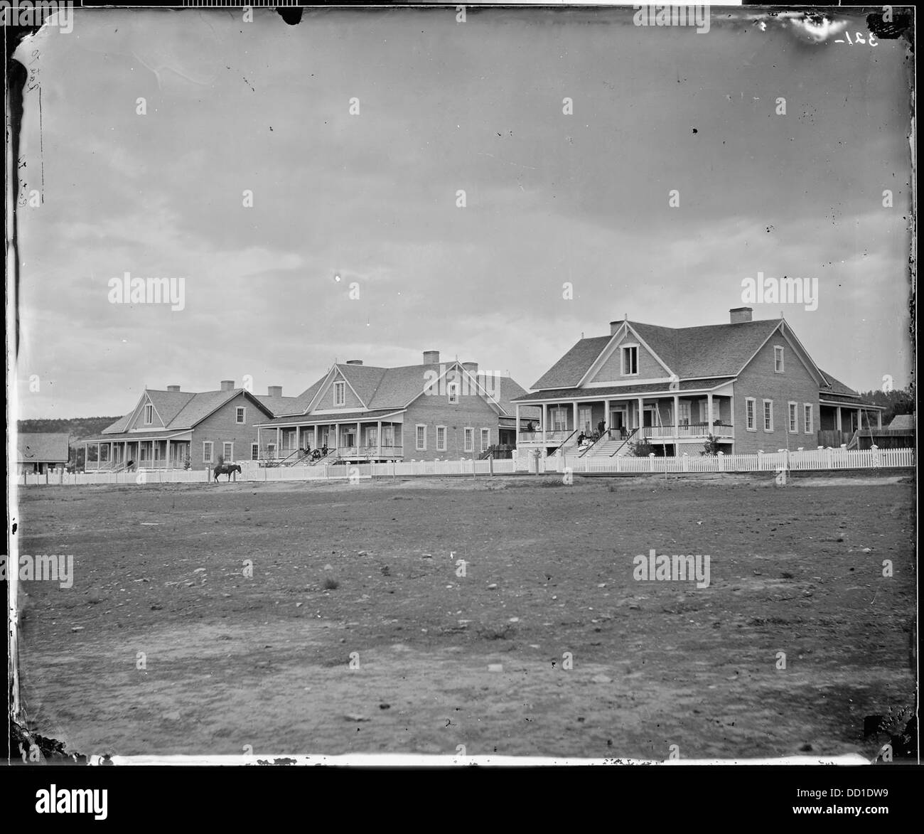 The officers' quarters at Fort Wingate, New Mexico, are depicted ...