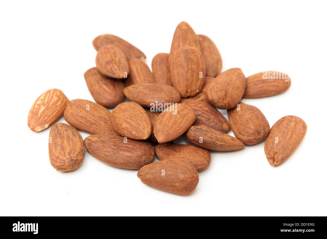 dried almonds on a white background Stock Photo - Alamy