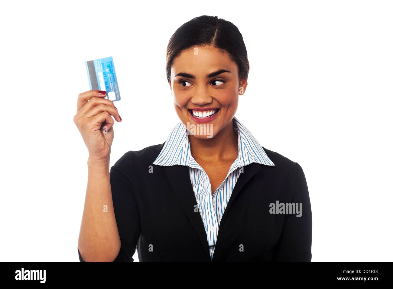 Smiling corporate woman holding up her credit card Stock Photo - Alamy