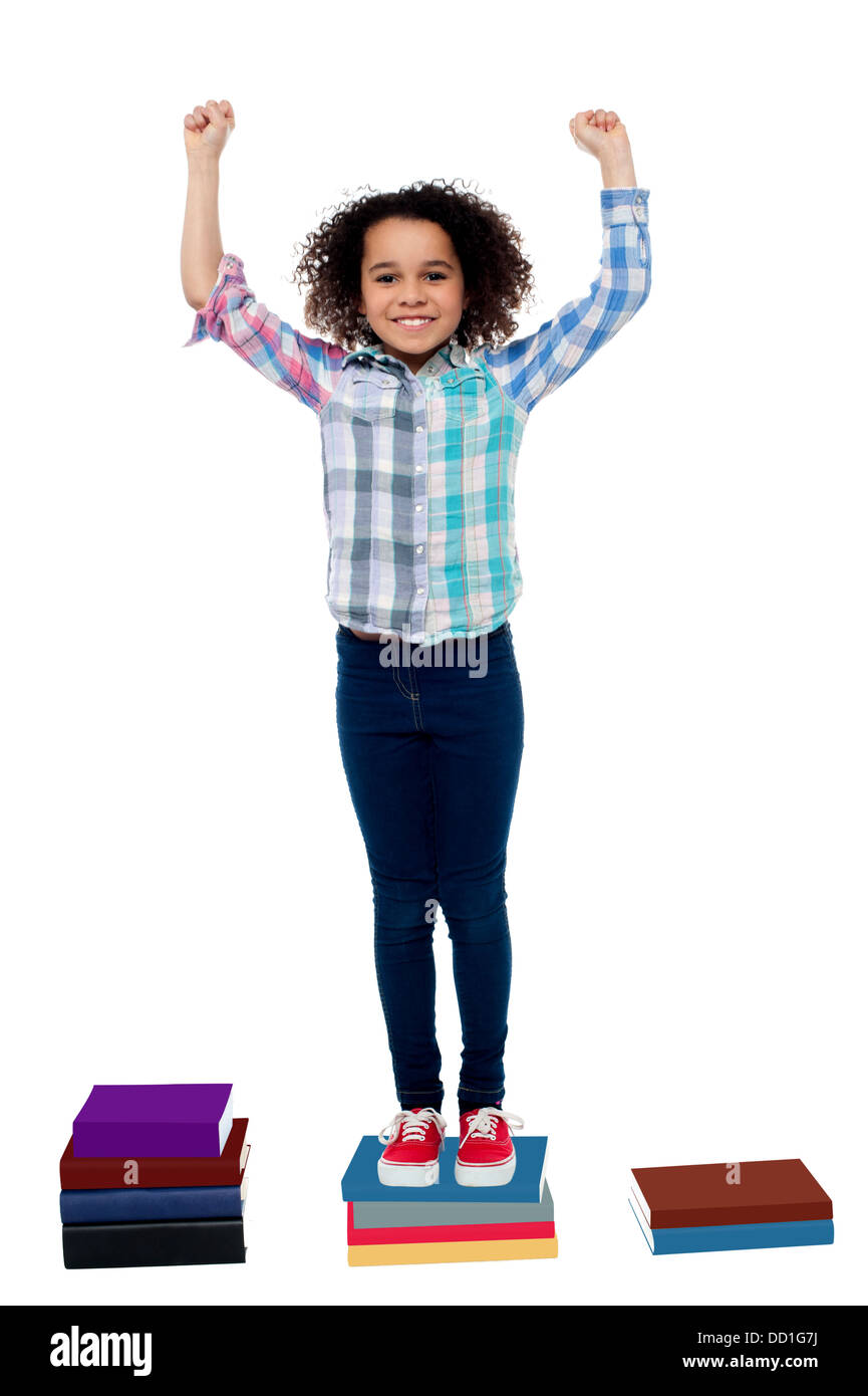 Yippee I stood first in my class. Excited schoolgirl Stock Photo - Alamy