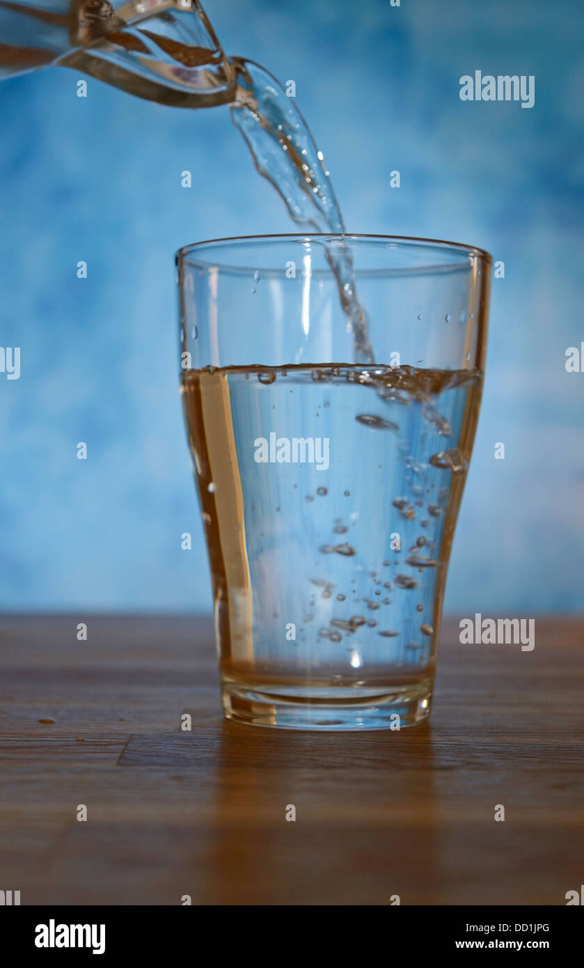 Pouring fresh water Stock Photo - Alamy