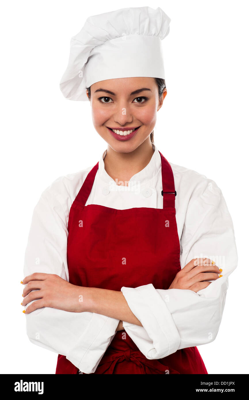 Young beautiful chinese female chef posing with confidence Stock Photo ...