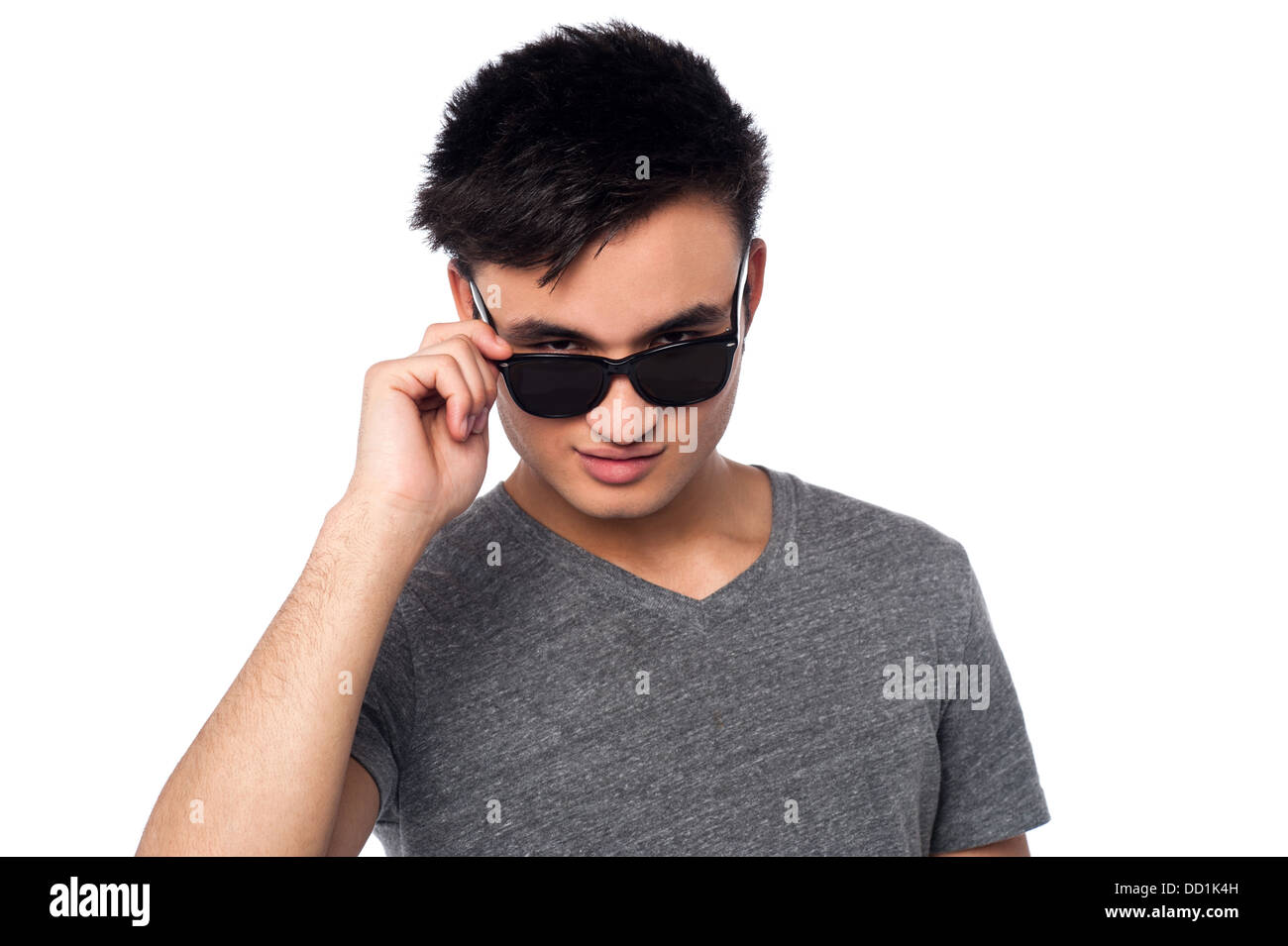 Handsome guy staring at you from within sunglasses Stock Photo - Alamy