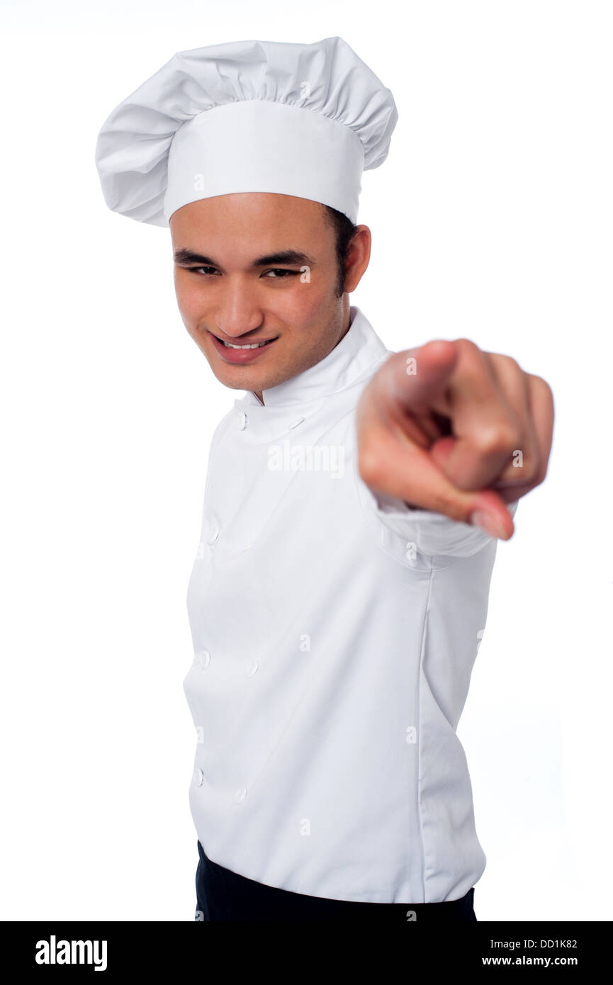 Smart cool male chef pointing you out Stock Photo - Alamy