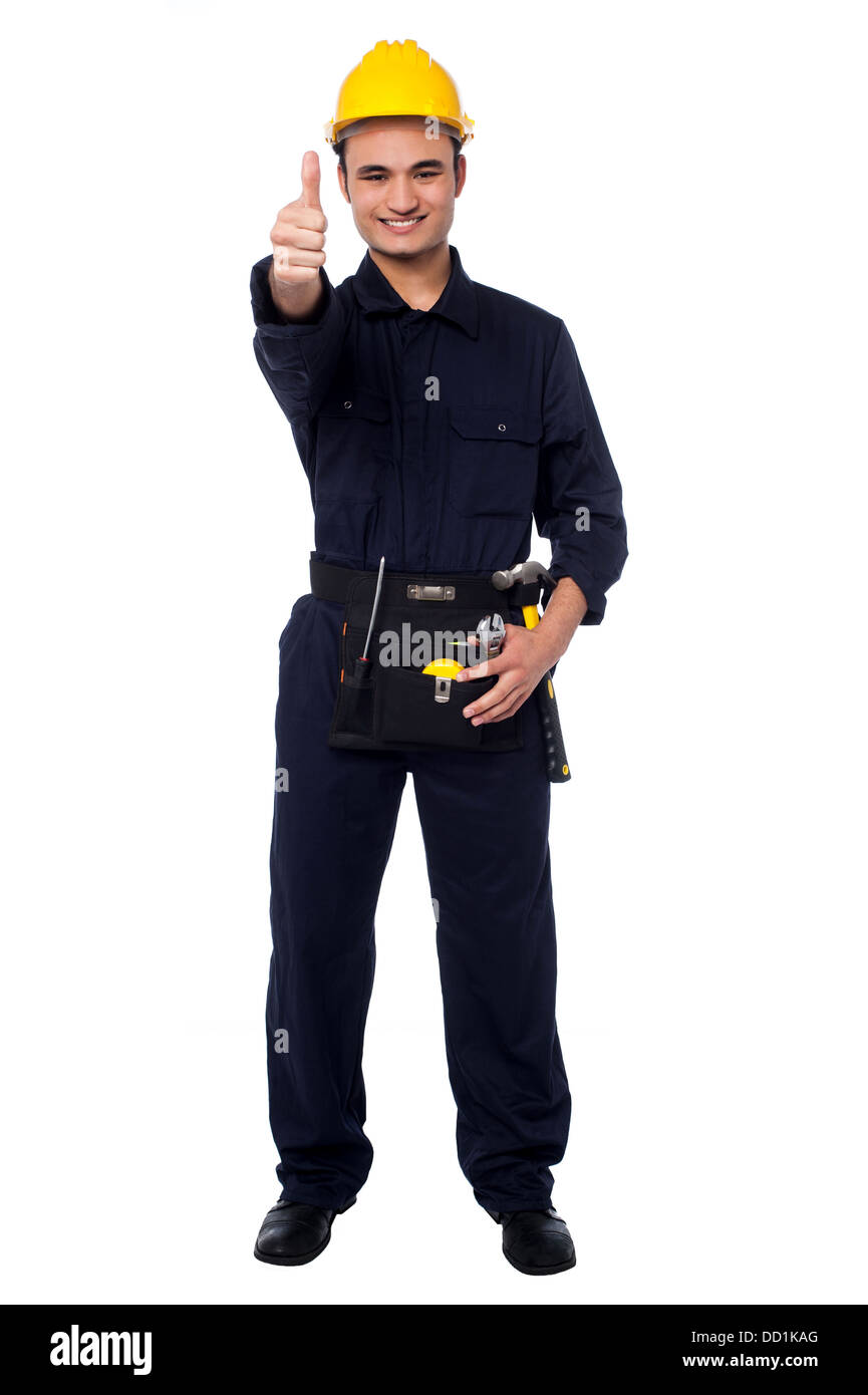 Young male construction worker showing thumbs up gesture Stock Photo ...