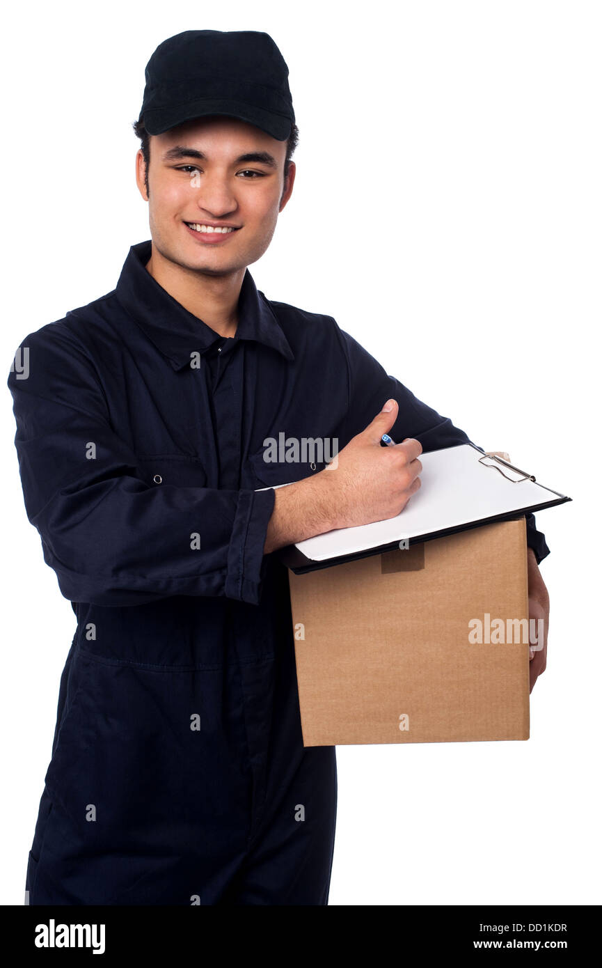 Young cheerful asian courier boy delivering you carton Stock Photo - Alamy