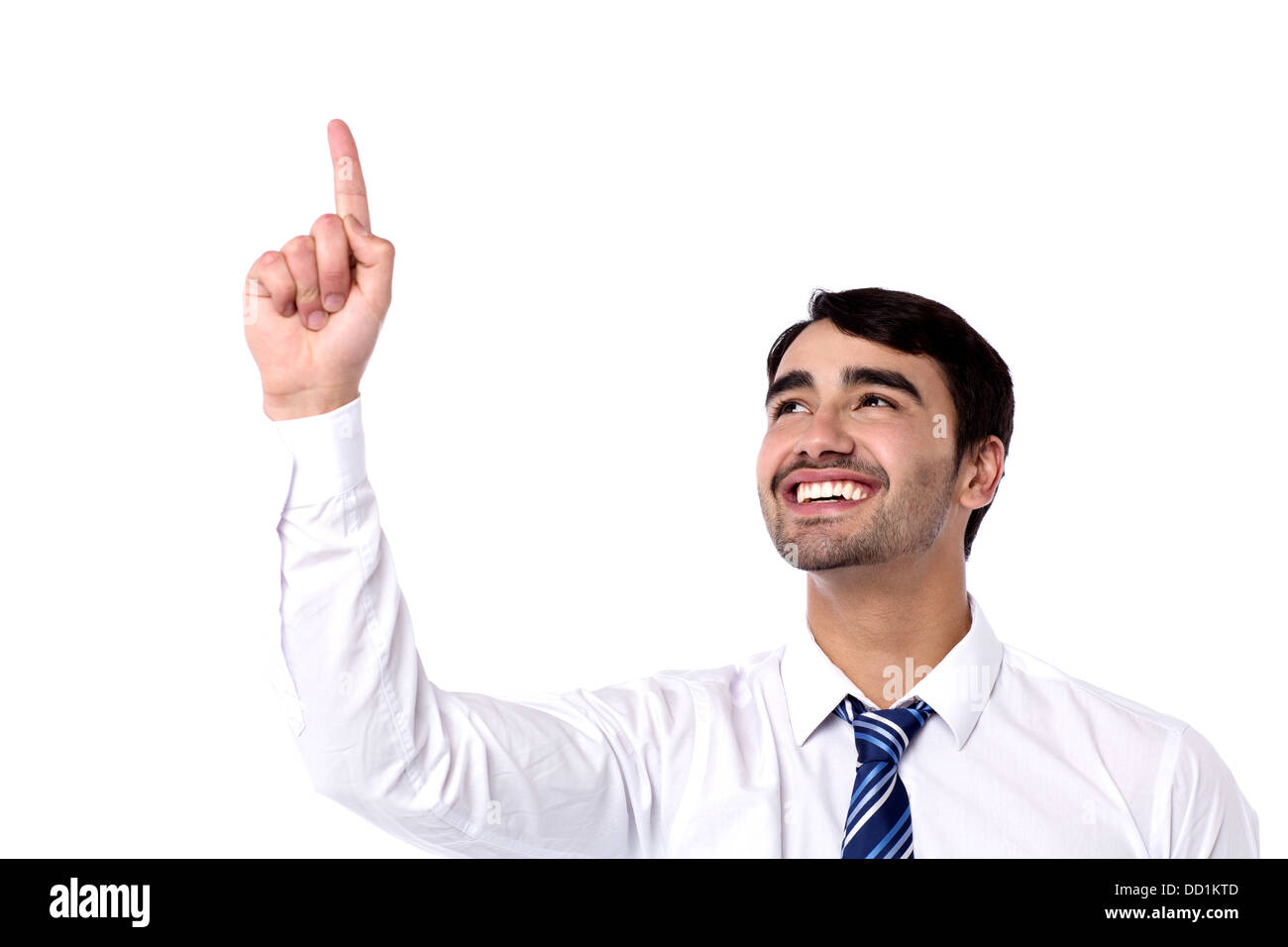 Happy businessman pointing upwards isolated against white background ...