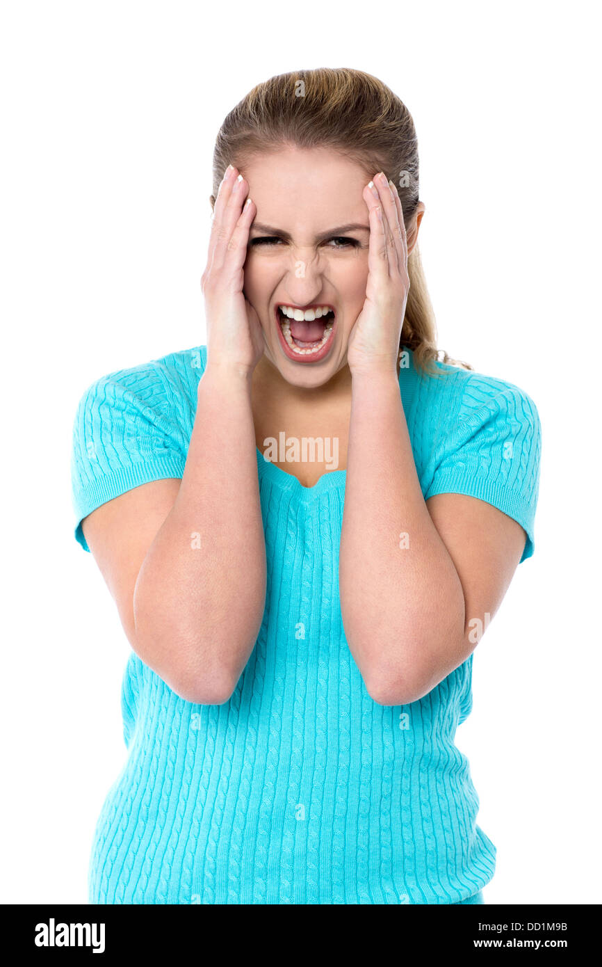 Frustrated woman screaming out loud Stock Photo - Alamy