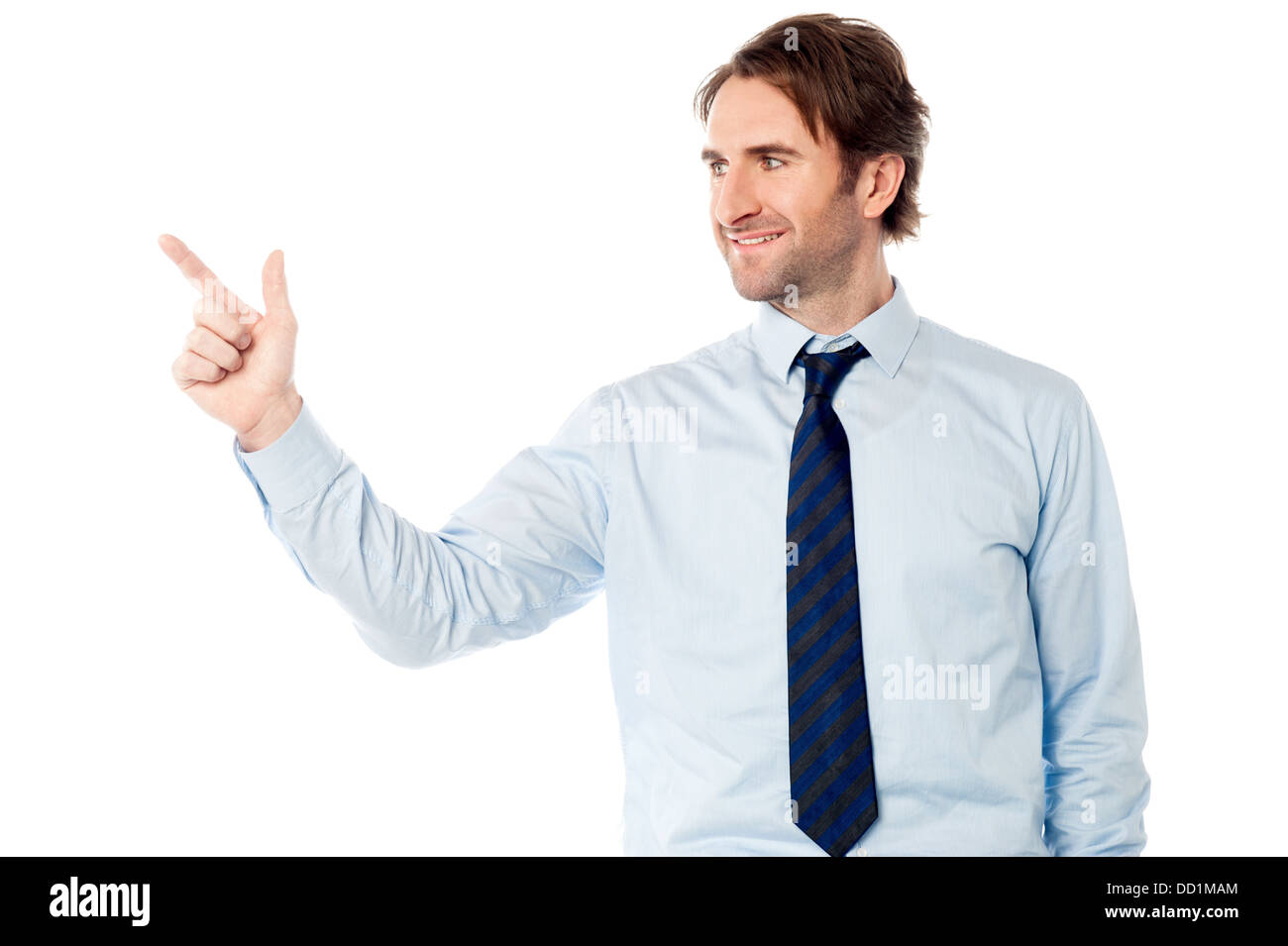 Smart male executive pointing towards copy space area Stock Photo - Alamy