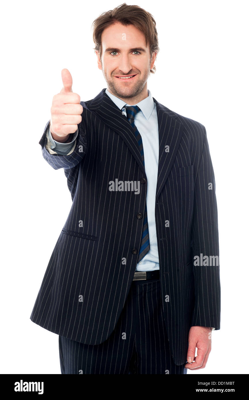 Isolated male manager gesturing thumbs up Stock Photo - Alamy