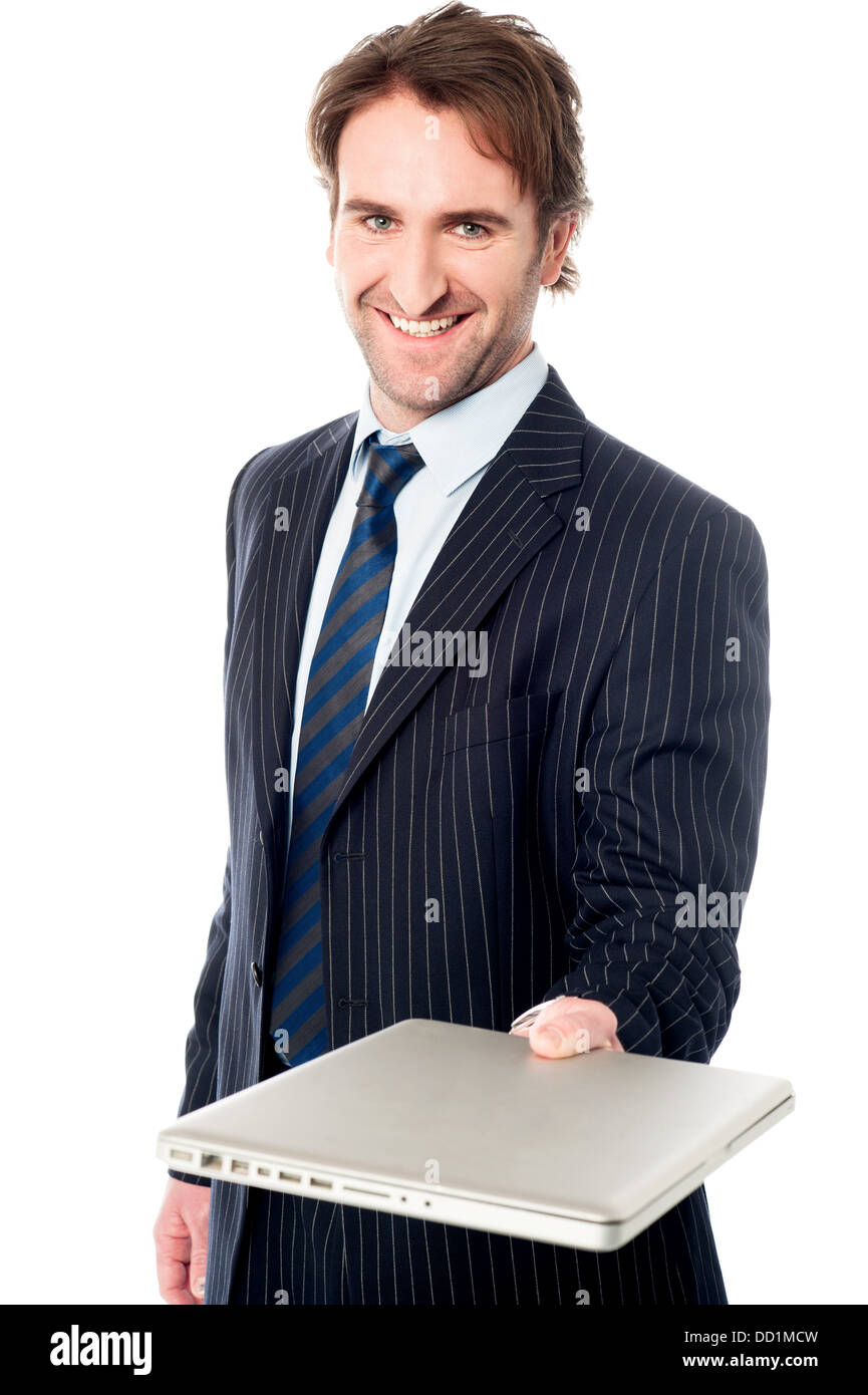 Corporate guy offering his laptop to you Stock Photo - Alamy
