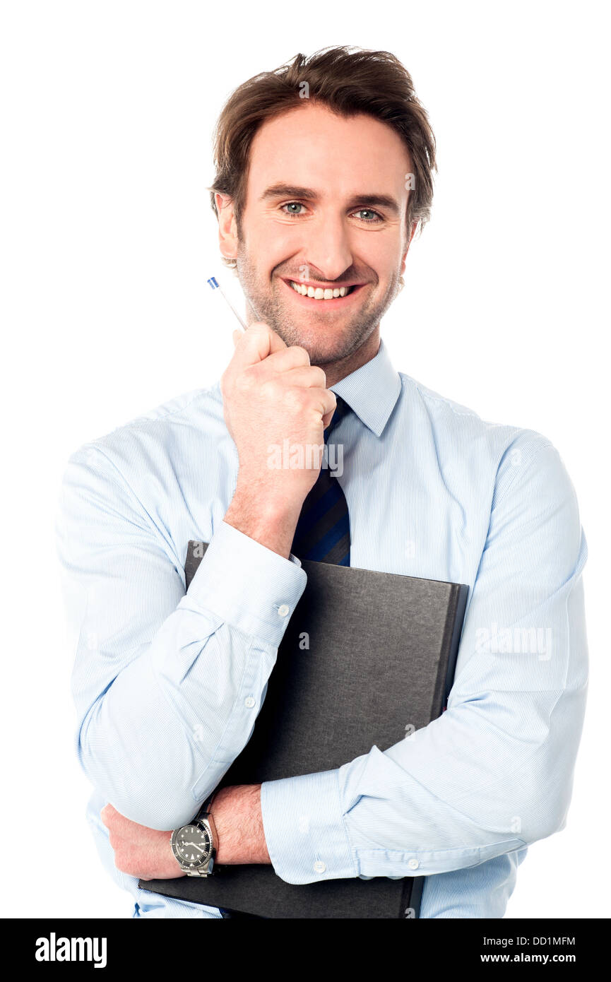 Handsome smiling man holding business file Stock Photo - Alamy