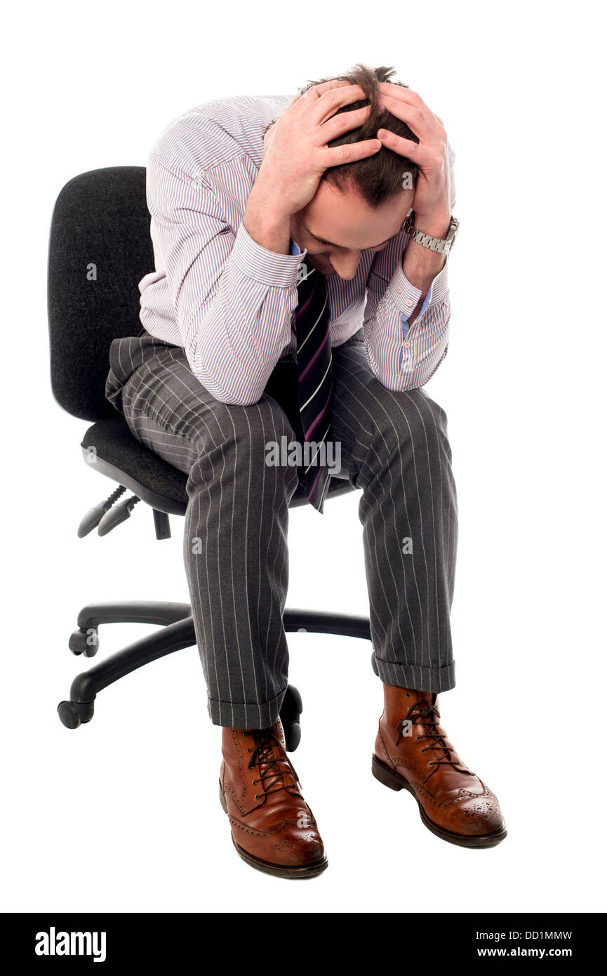 Man holding his head in frustration Stock Photo - Alamy